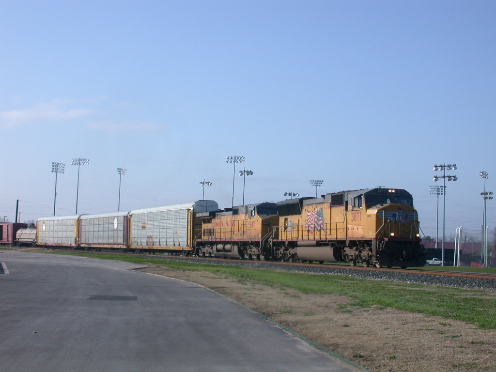 UP 3877 14Feb2010 NB on the old MoPac-Katy Team Track